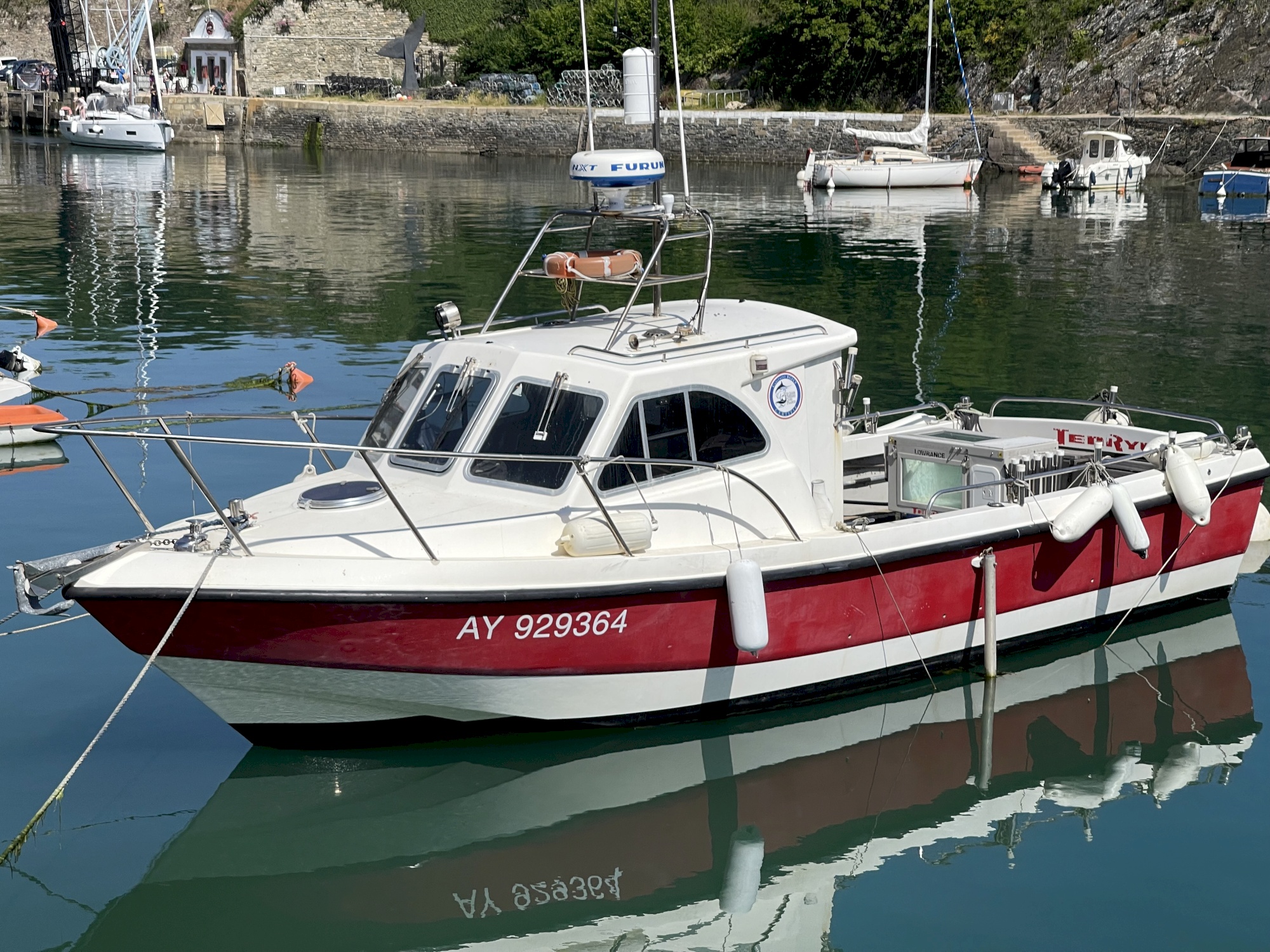 Timonier Navire à Utilité Collective utilisé par un Guide de Pêche ...
